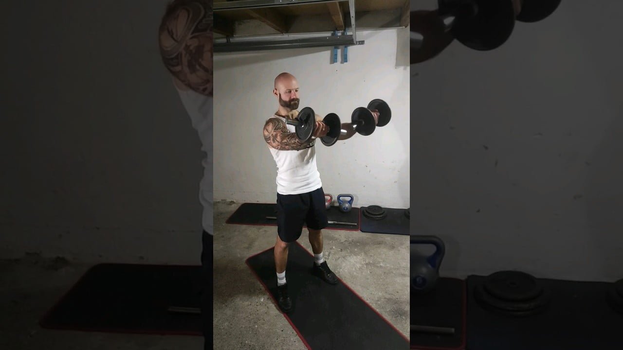 Élévation frontale debout haltère supination [VIDÉO] | Papa Muscle